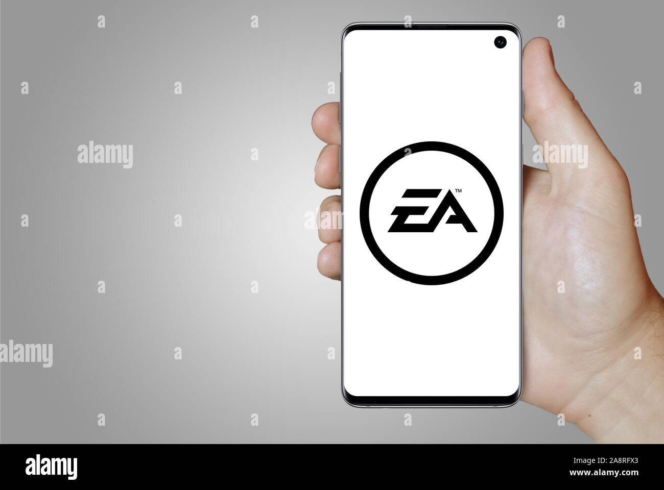 Logo of public company Electronic Arts displayed on a smartphone. Grey ...