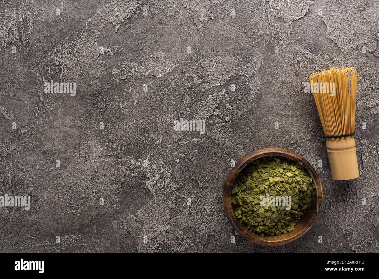 top view of matcha green tea powder on dark stone table Stock Photo - Alamy