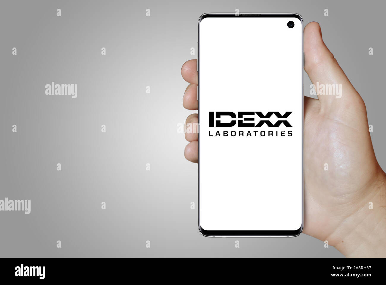 Logo of public company IDEXX Laboratories displayed on a smartphone ...