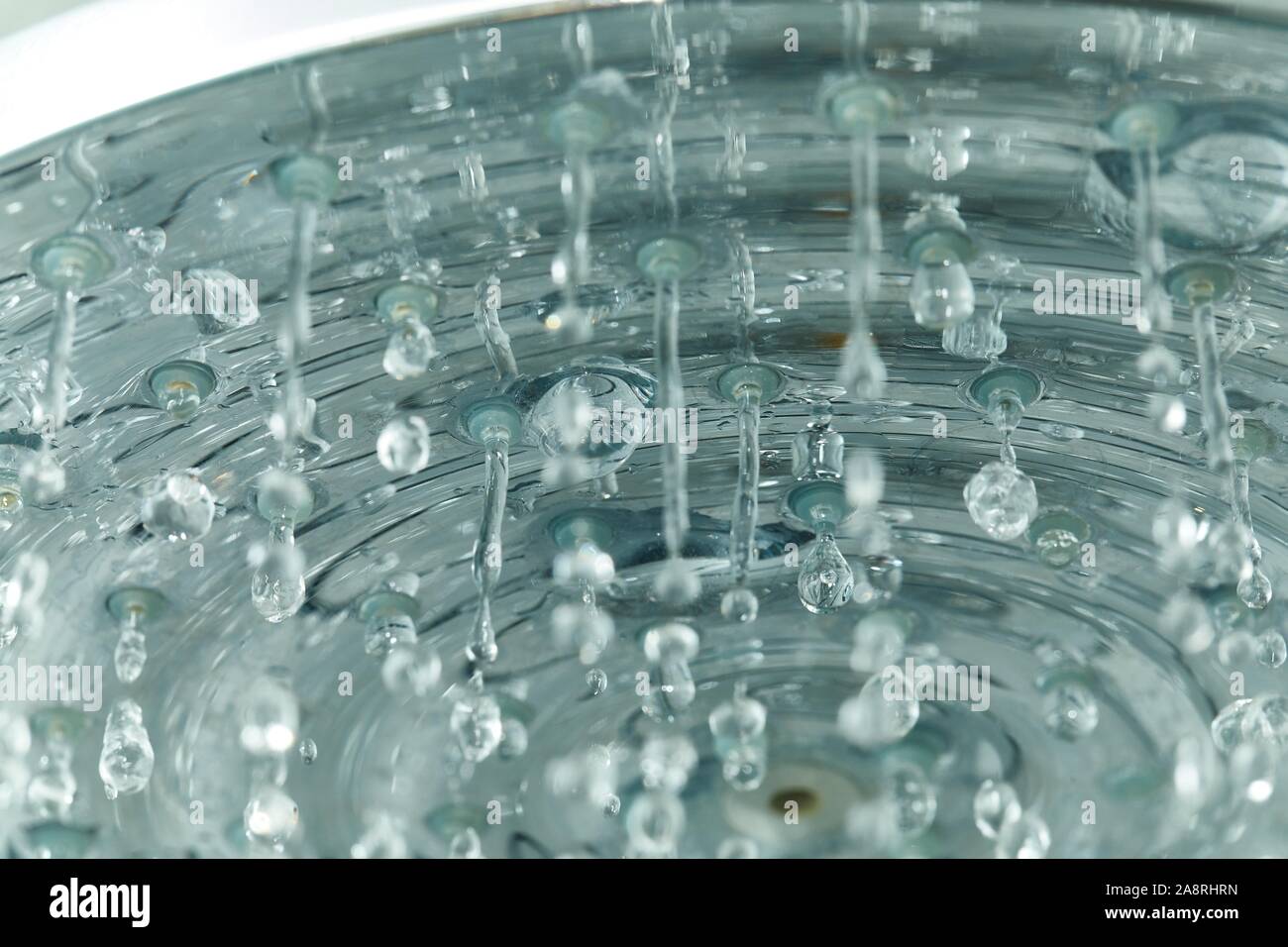 Shower water flowing Stock Photo - Alamy