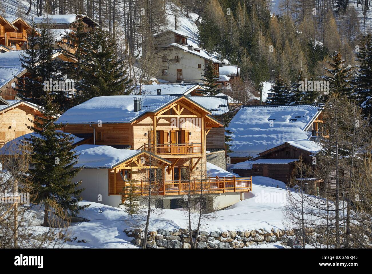 Skiing village in the Alps on a nice sunny day Stock Photo - Alamy