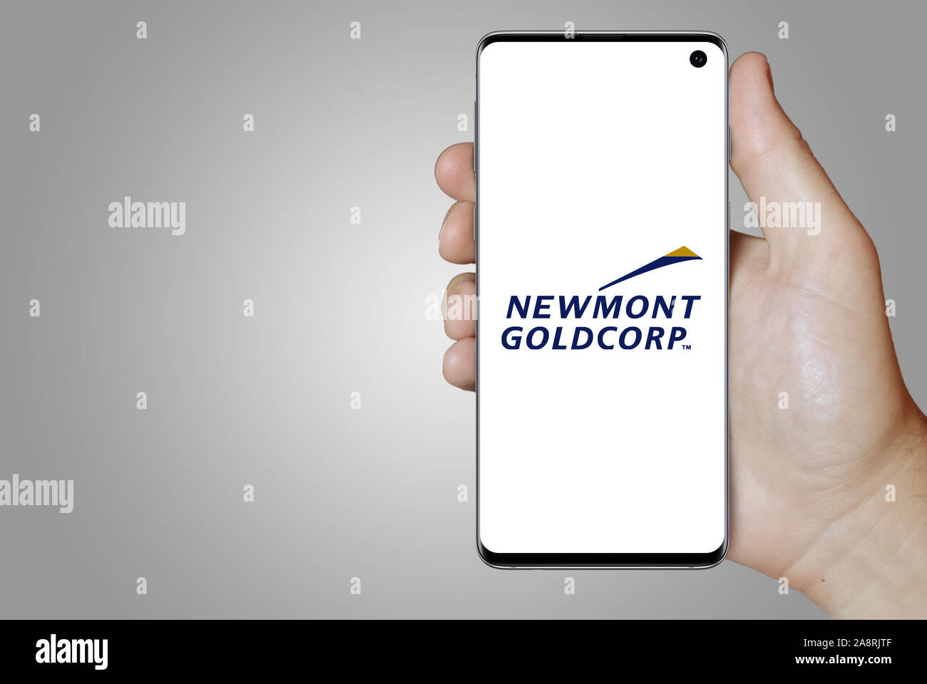 Logo of public company Newmont Goldcorp displayed on a smartphone. Grey ...