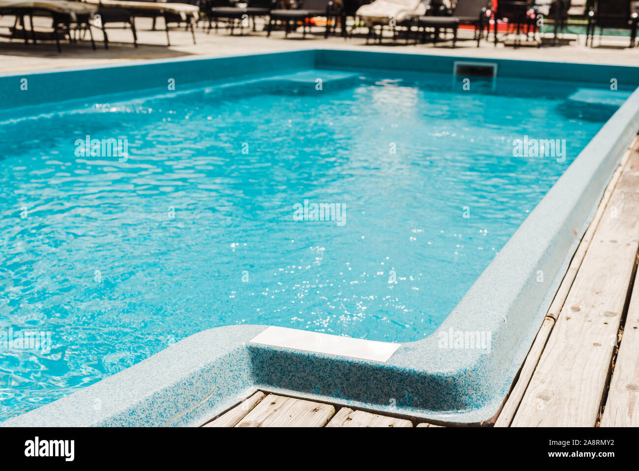 swimming pool with clean blue water in beach club outdoors Stock Photo ...