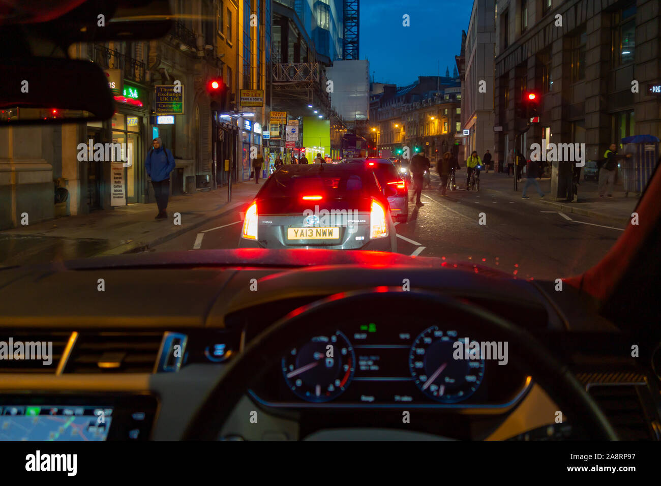 Drivers view of traffic driving through the streets of London City at ...