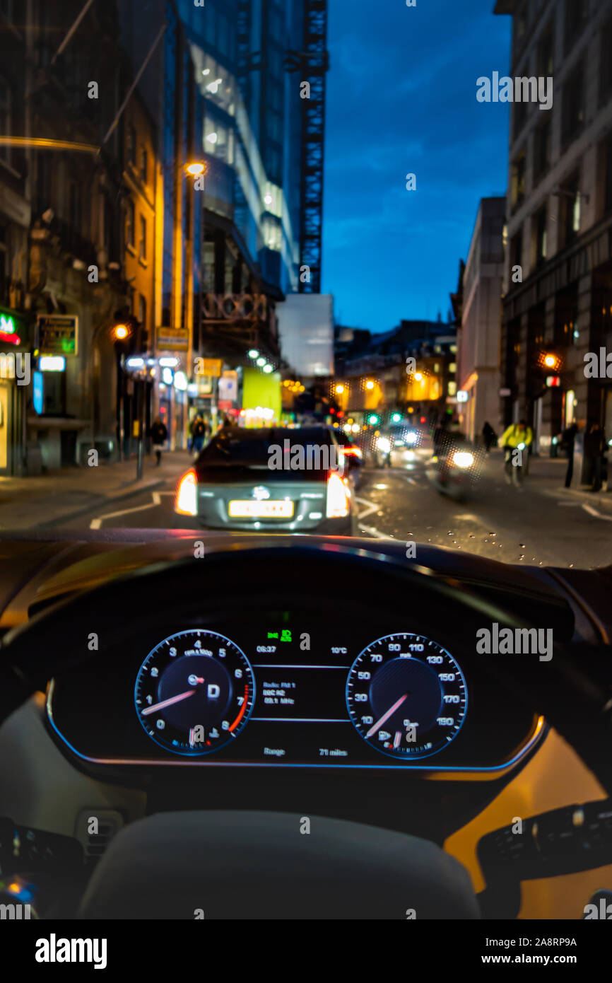 Drivers view of traffic driving through the streets of London City at ...