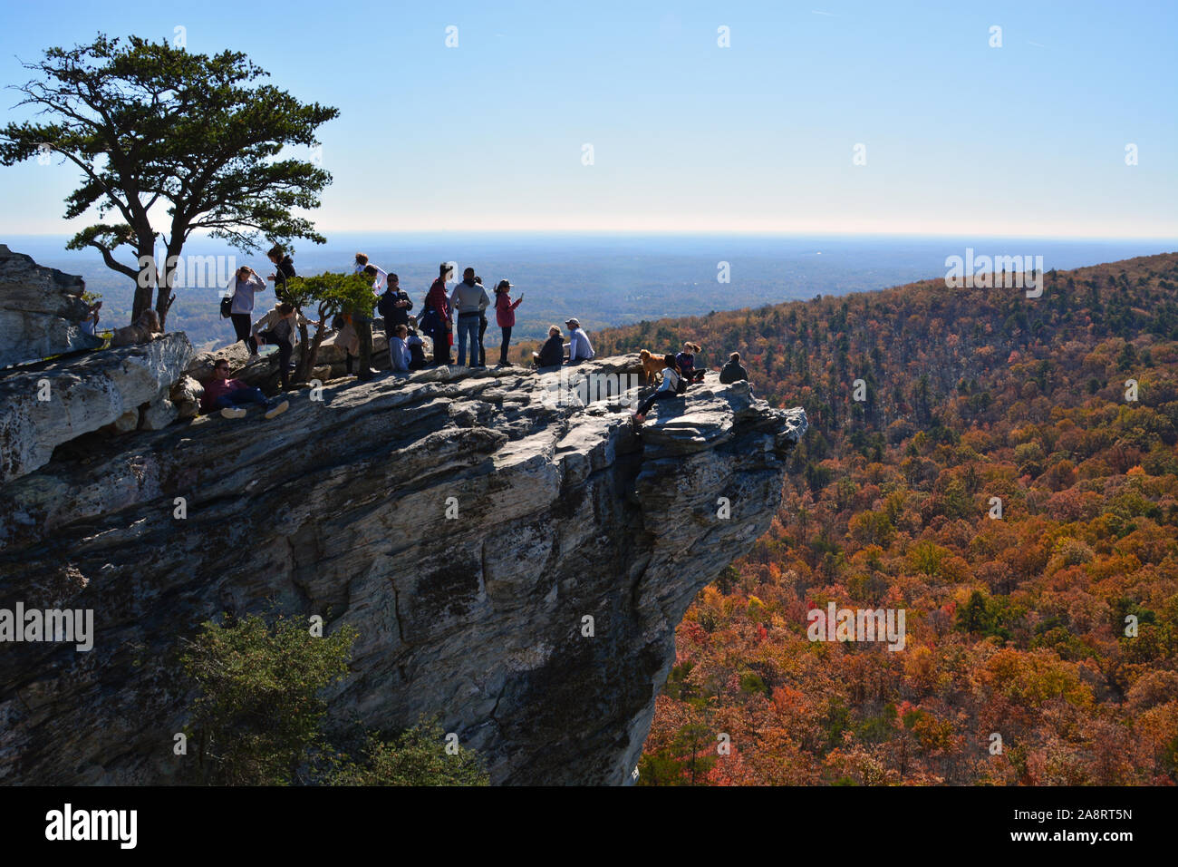 Visitors crowd dangerously to the edge of the overlook to view the Fall ...