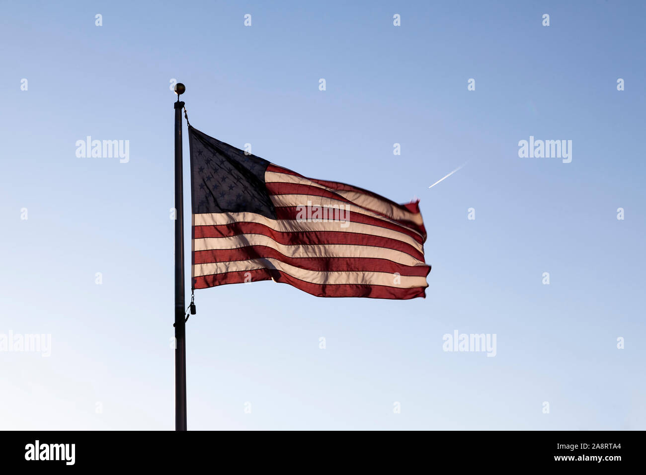 Flag flying on flagpole hi-res stock photography and images - Alamy