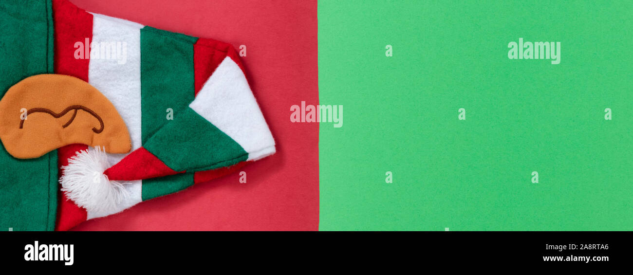 Red and green background with Elf cap for Christmas season Stock Photo ...