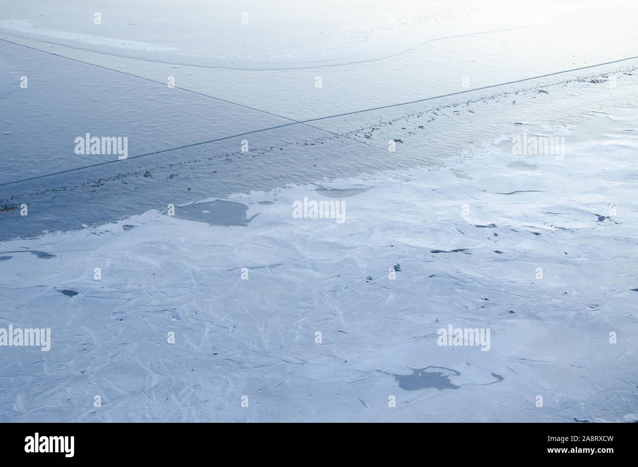 A lake covered in ice Stock Photo - Alamy