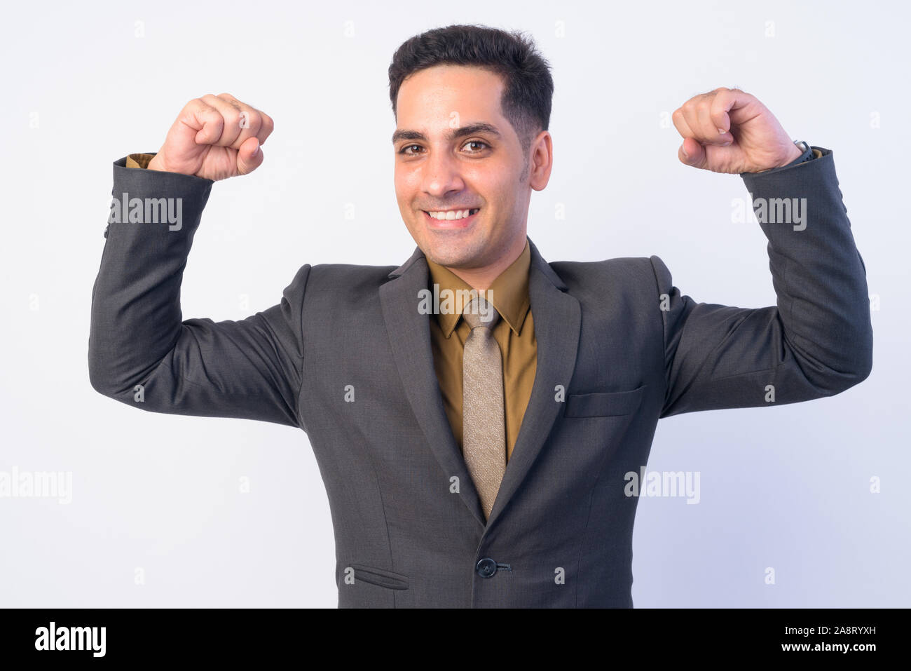 Strong business man flexing muscle hi-res stock photography and images ...