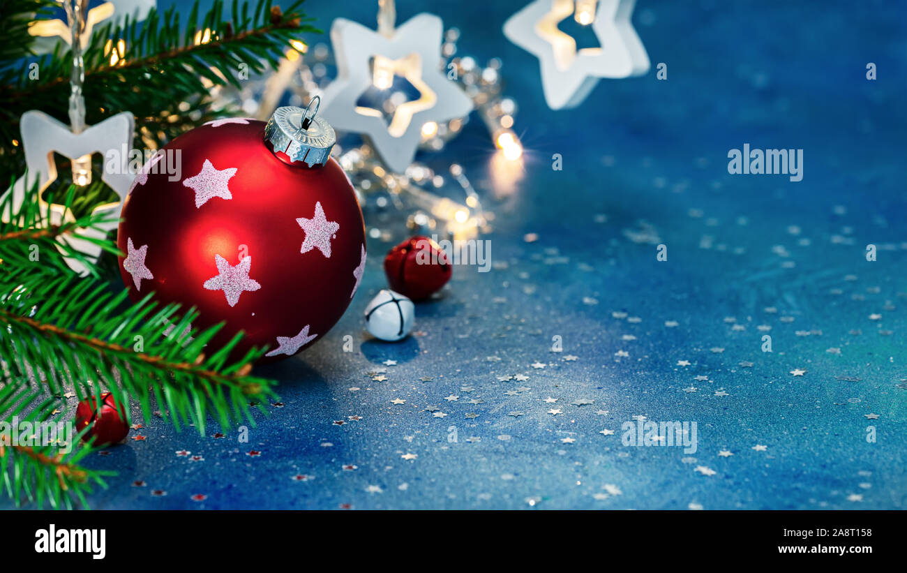 new year background with red ball, christmas jingle bells, green fir ...