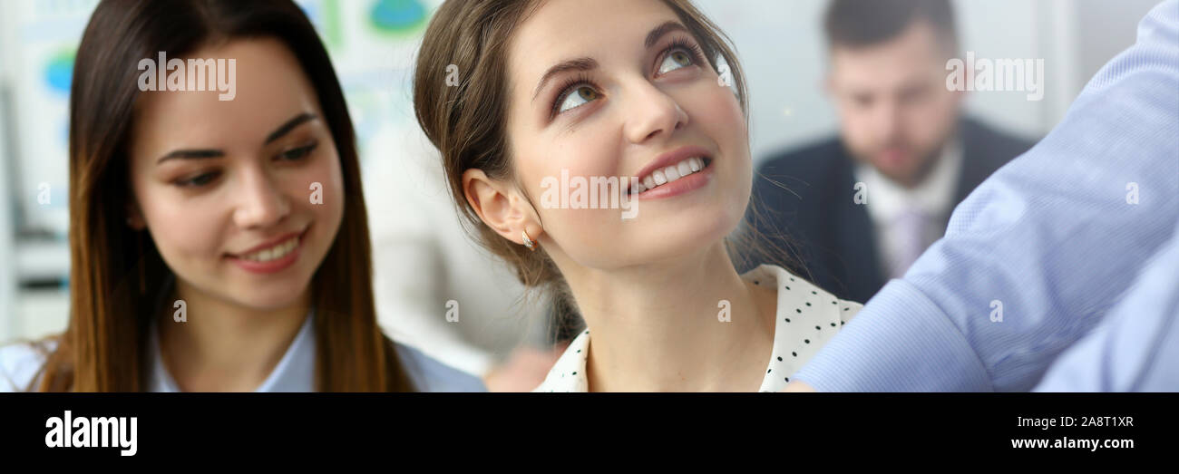 Pretty colleagues in high-tech building Stock Photo - Alamy