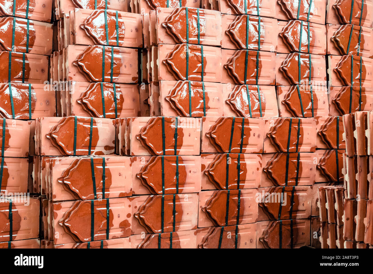 Close up to many pile of roof tiles traditional clay stack for a ...