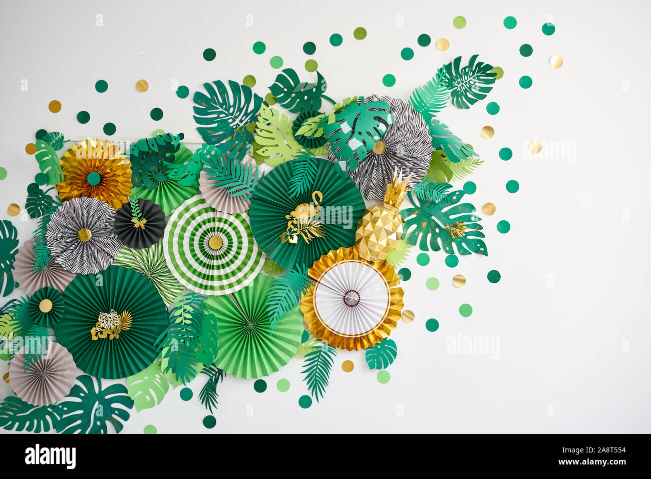 Green, emerald, gold and yellow papers circle shape of origami ...
