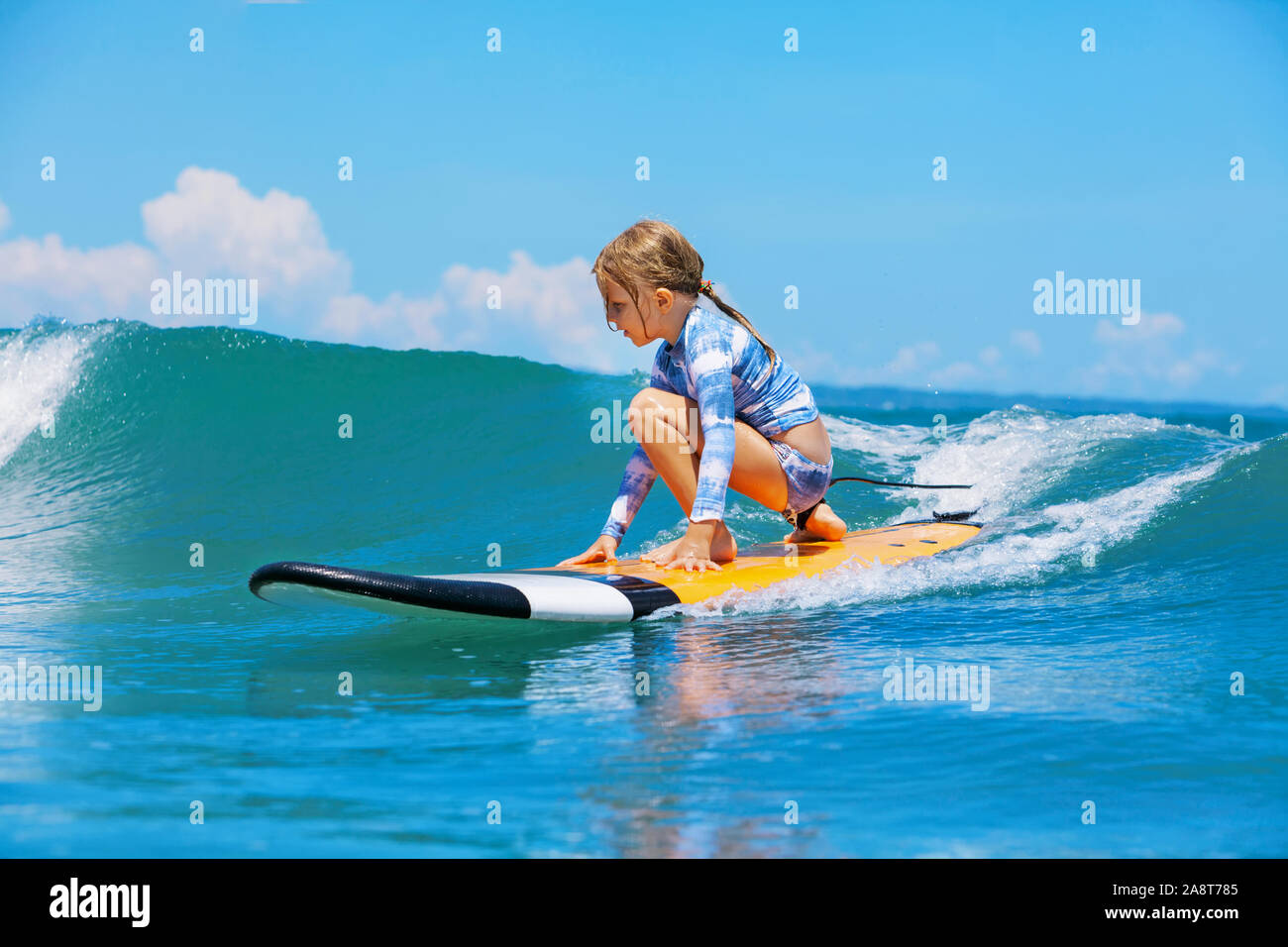 Children surfing hi-res stock photography and images - Alamy
