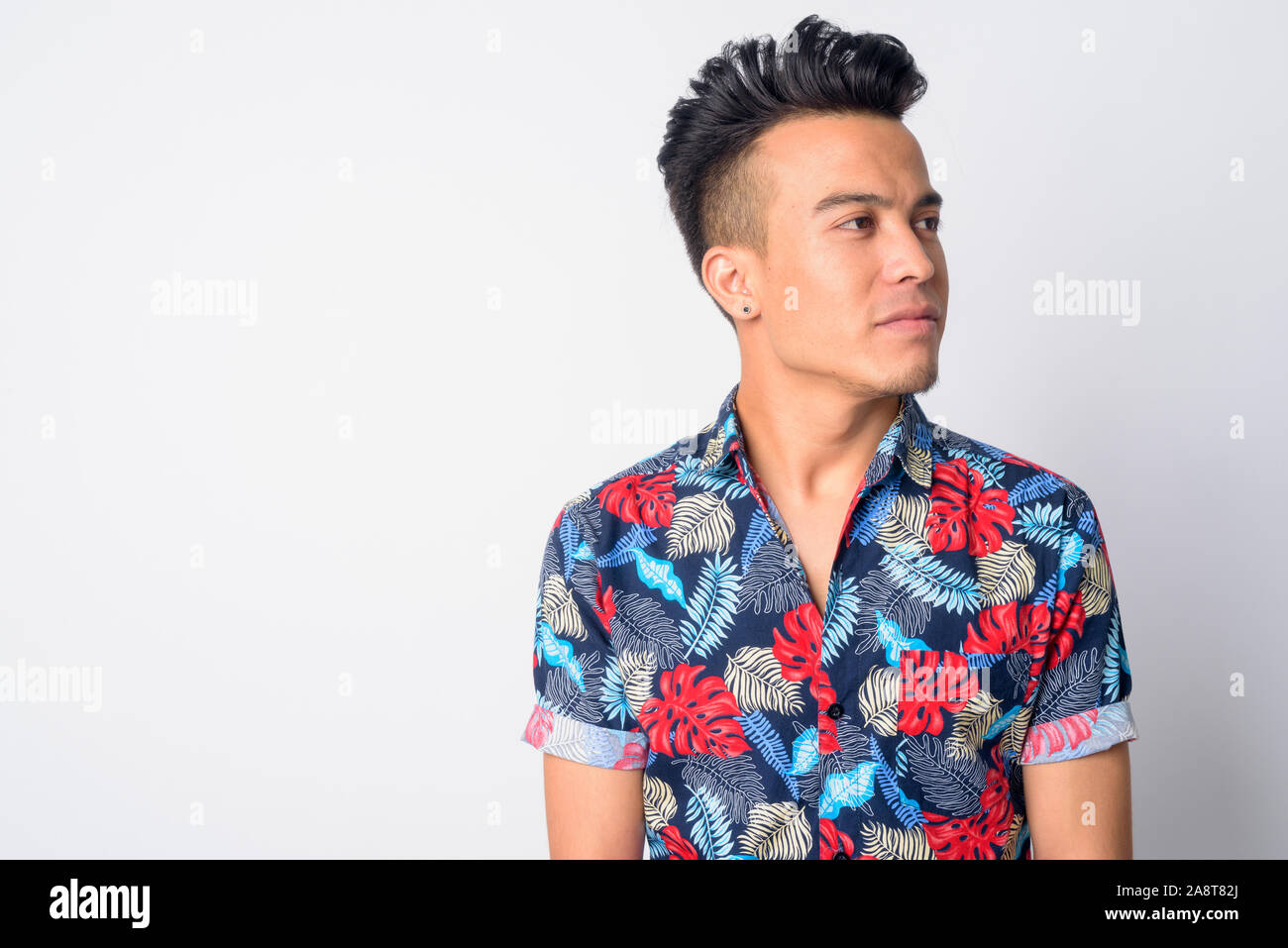 Face of young Asian man thinking and looking up Stock Photo - Alamy