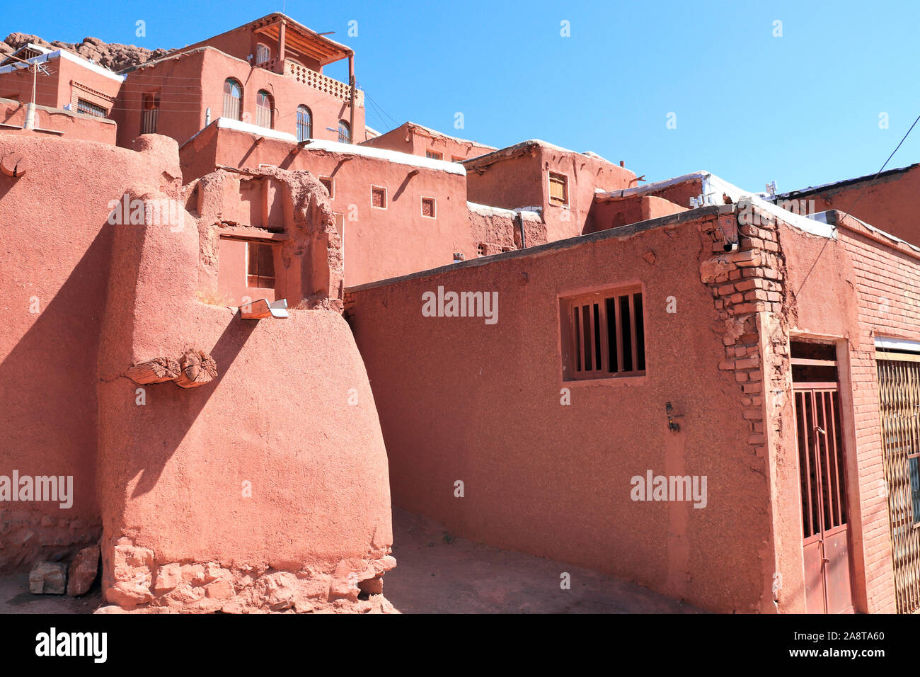 Red adobe houses hi-res stock photography and images - Alamy