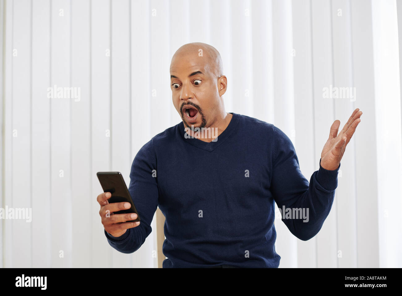 Young man text message fit hi-res stock photography and images - Alamy