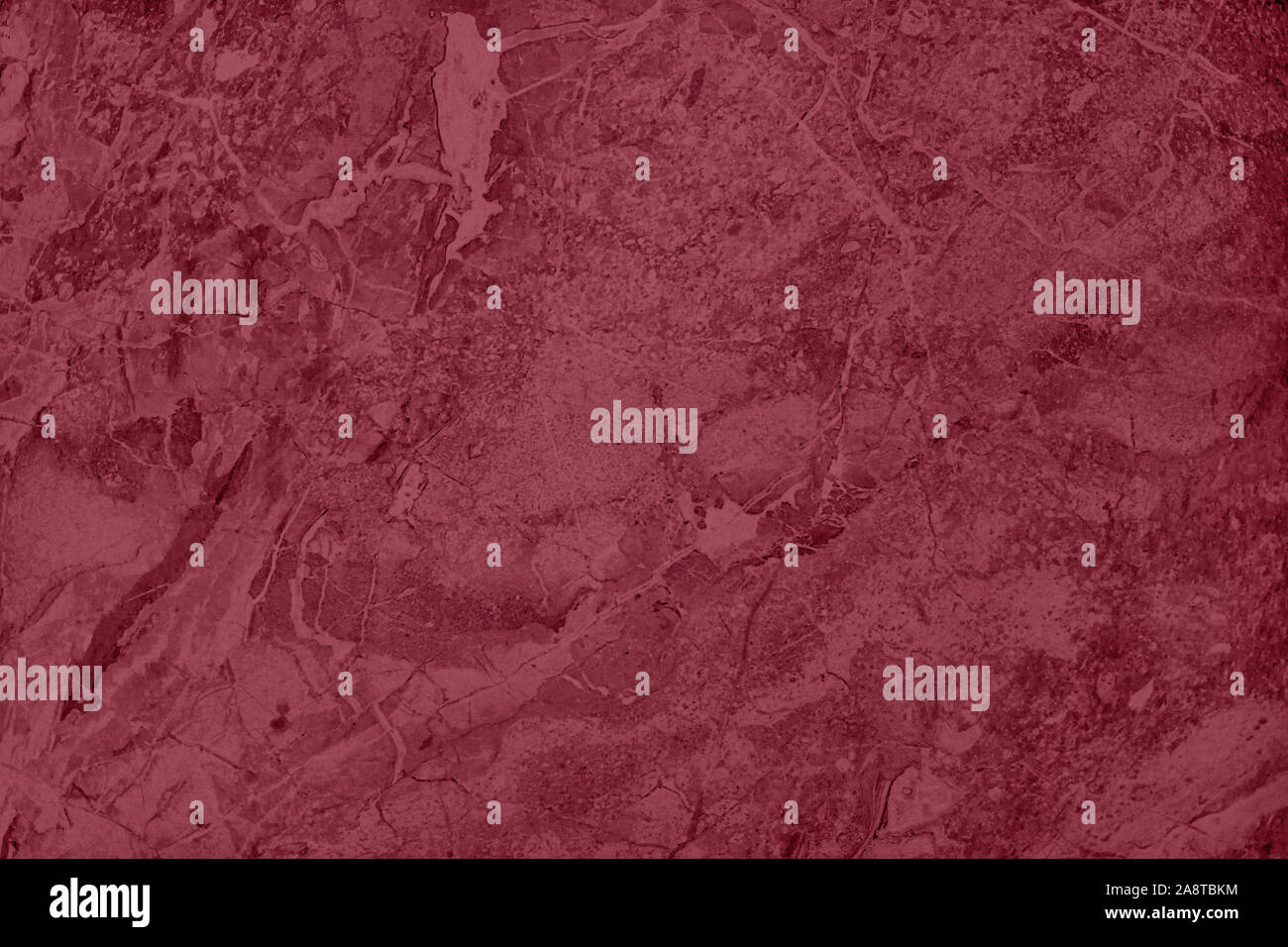 Dark red colored low contrast marble textured background with roughness ...