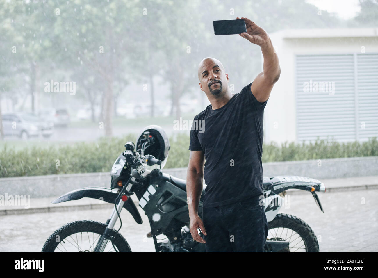 Cheerful bald man taking selfie hi-res stock photography and images - Alamy