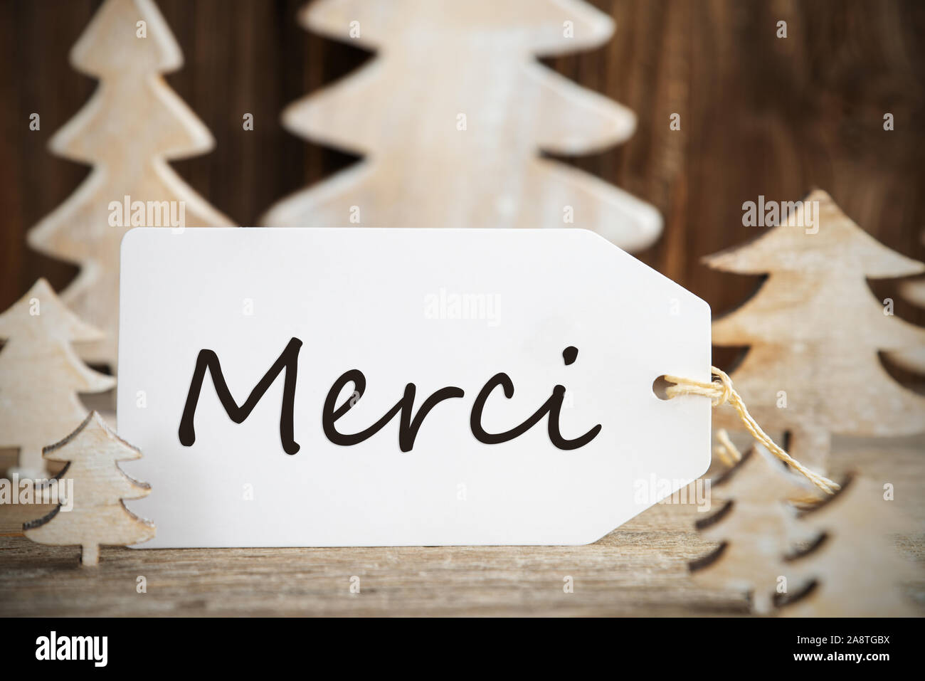 Christmas Tree, Label, Merci Means Thank You Stock Photo - Alamy