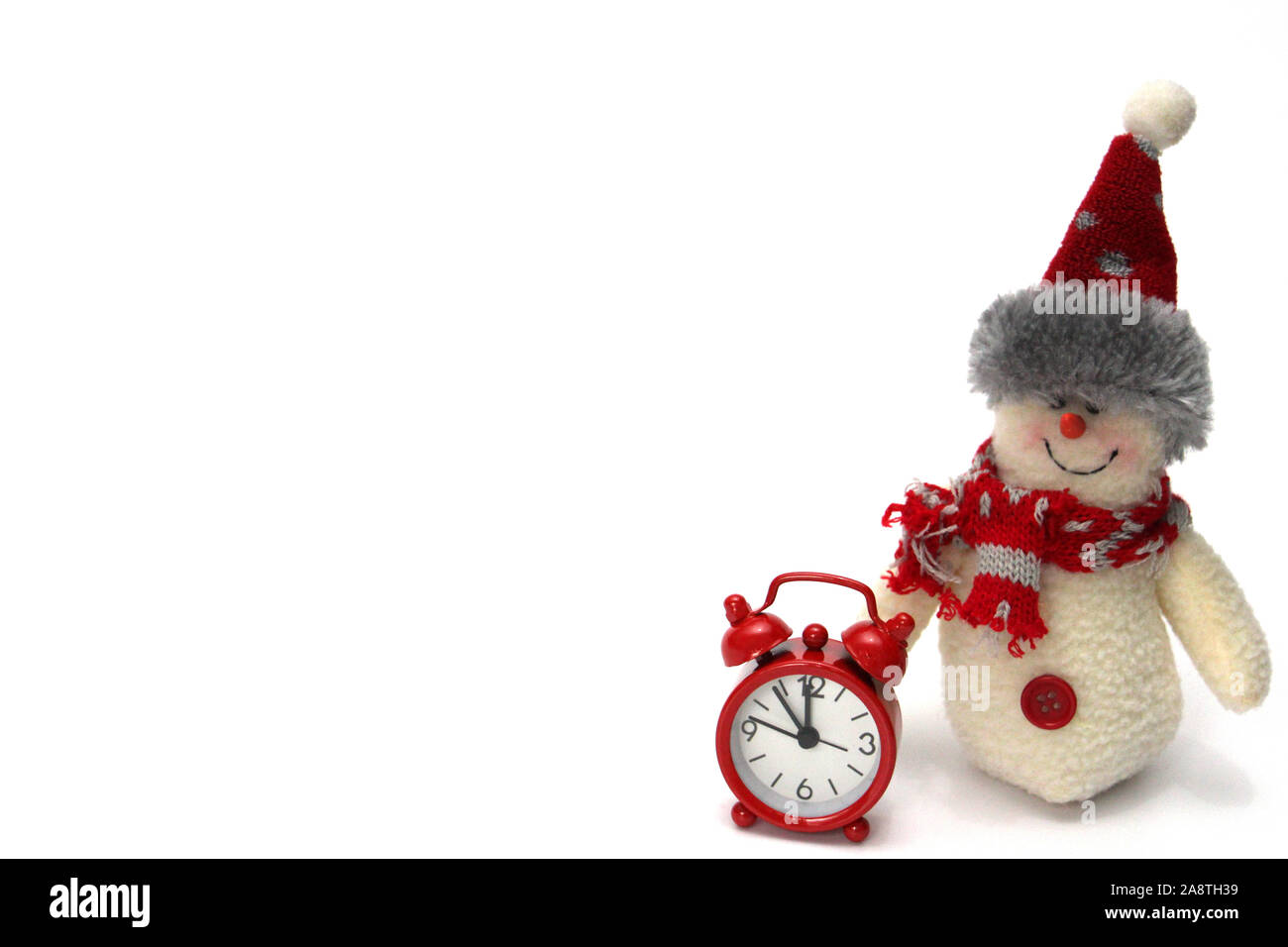 Snowman toy is ready to celebrate Christmas and New Year. Next to the ...