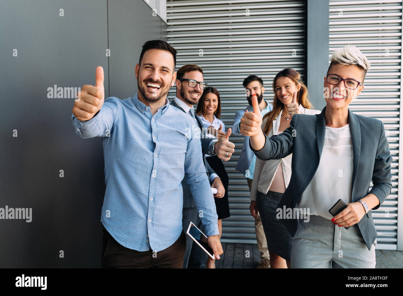 Business team celebrating achieving goals hi-res stock photography and ...