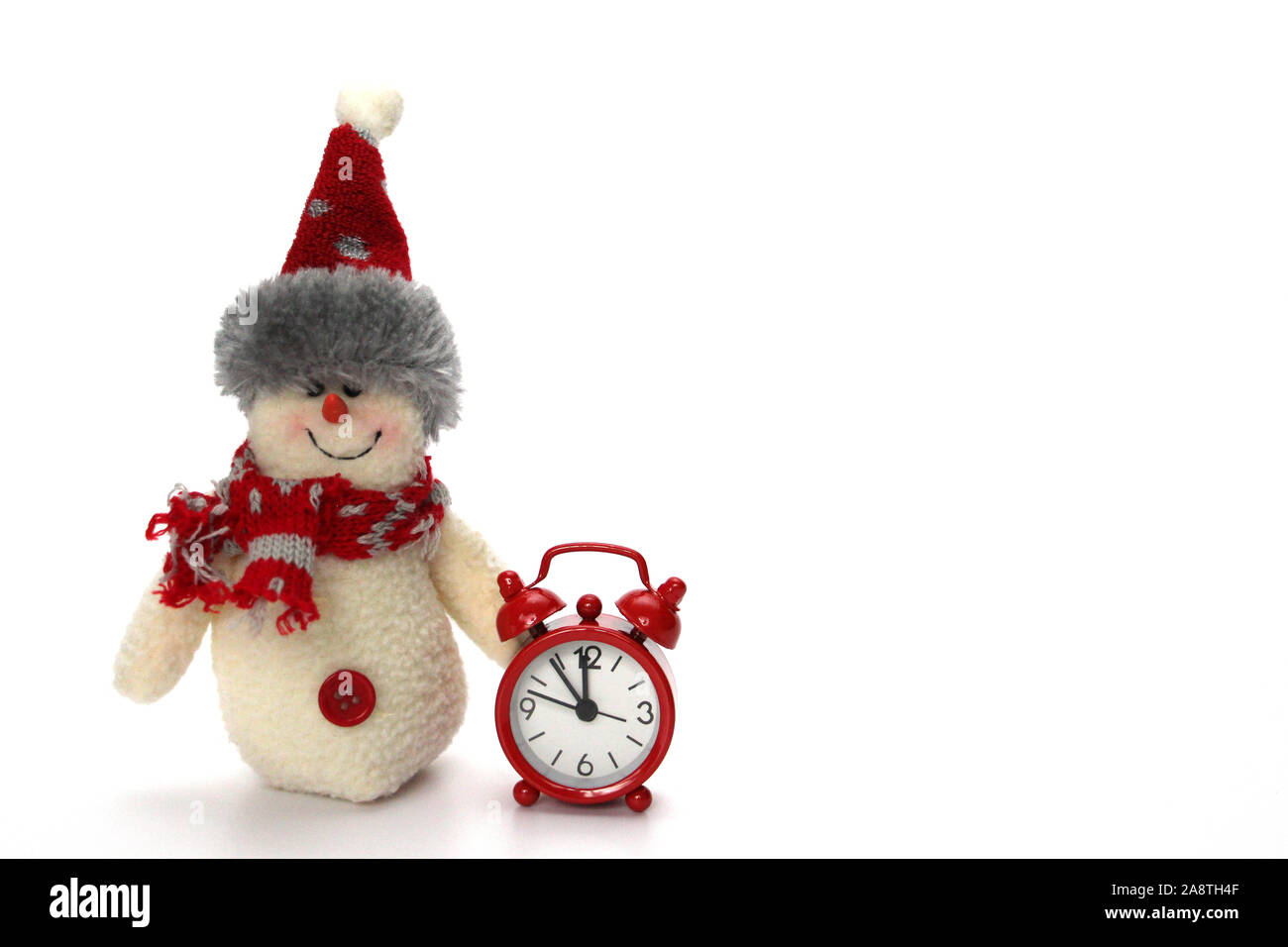 Snowman toy is ready to celebrate Christmas and New Year. Next to the ...