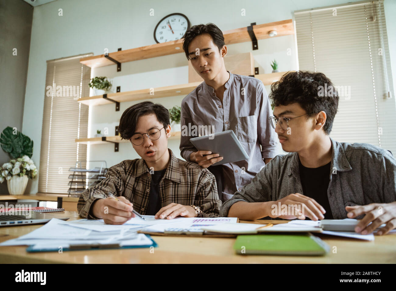 asian creative team working together Stock Photo - Alamy