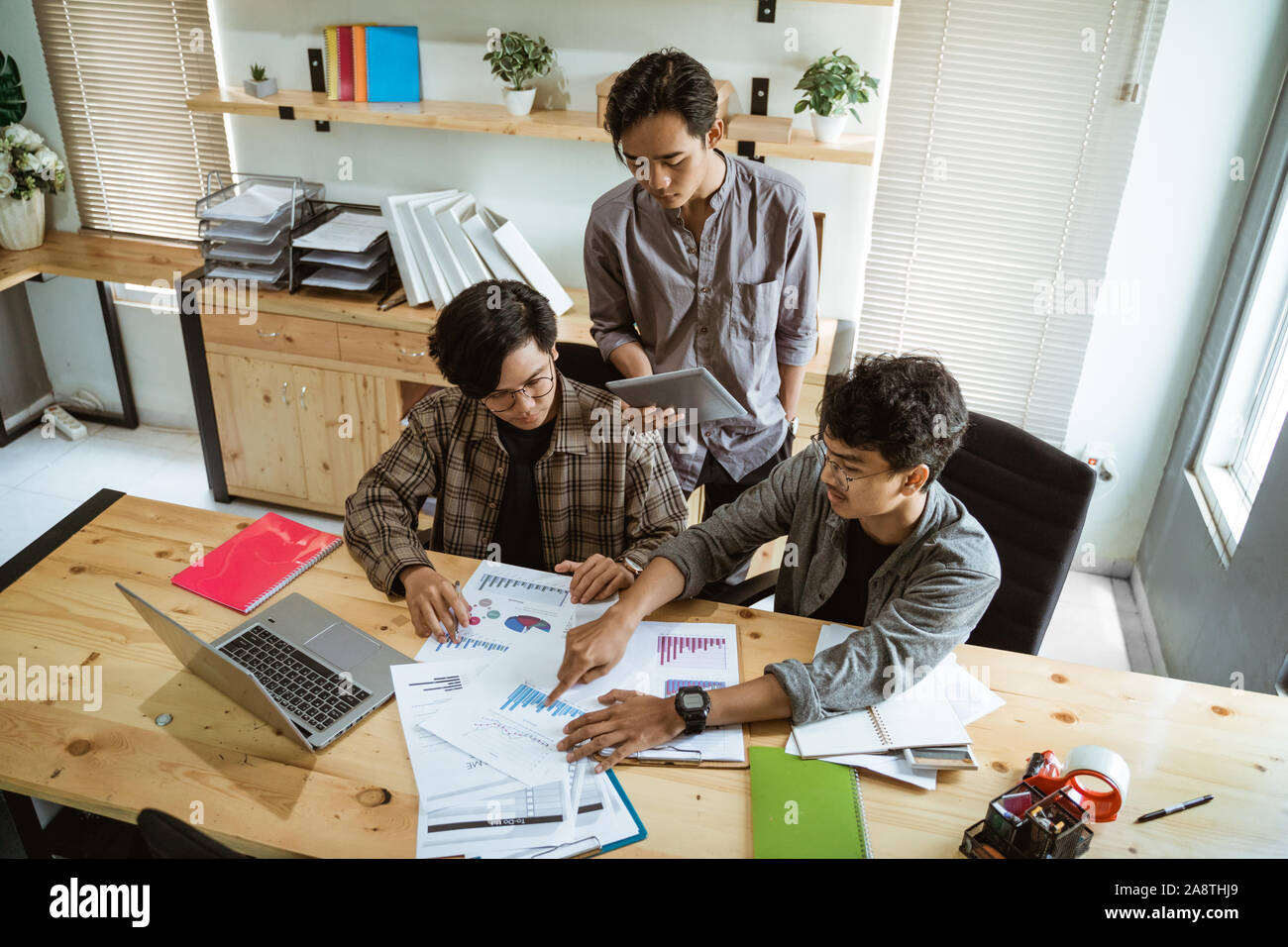 happy asian business partner in the office meeting Stock Photo - Alamy