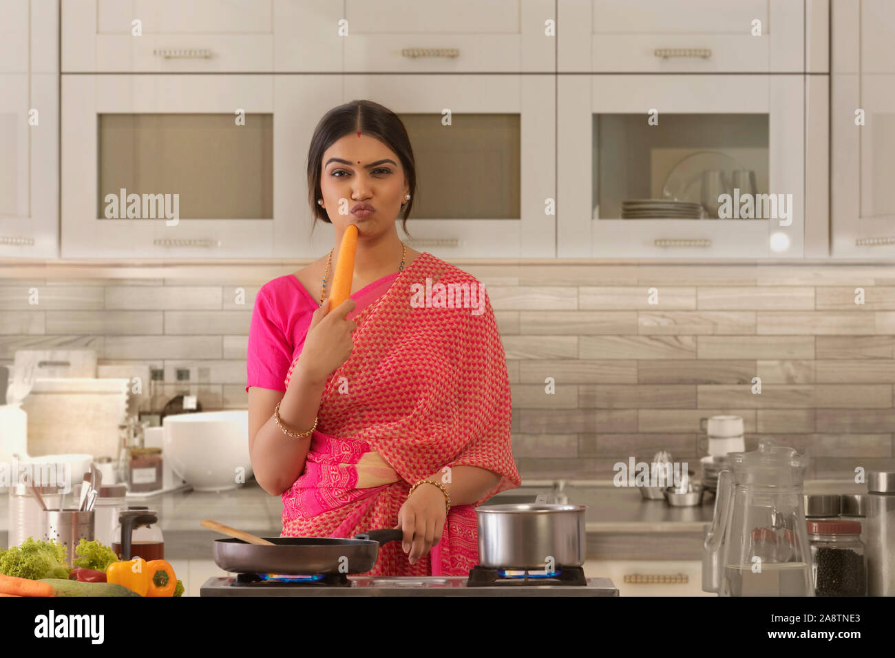 Woman in kitchen hi-res stock photography and images - Alamy