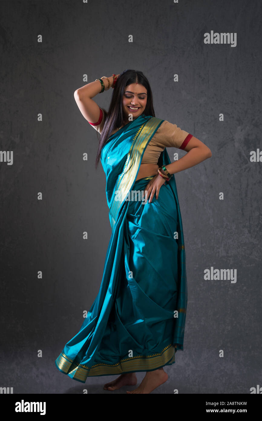 Dance in saree hi-res stock photography and images - Alamy