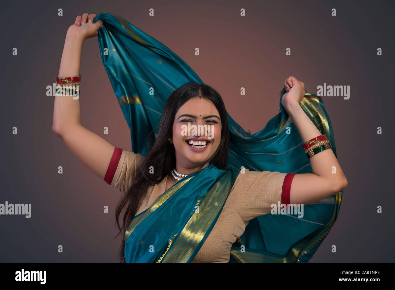young woman dancing in saree Stock Photo - Alamy