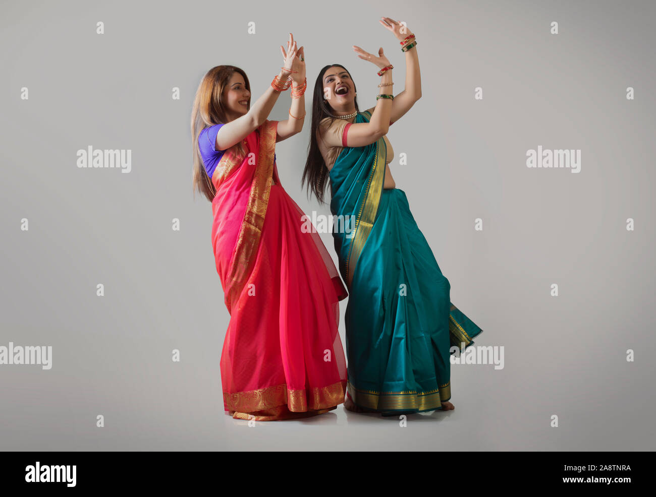 young women dancing in saree Stock Photo - Alamy