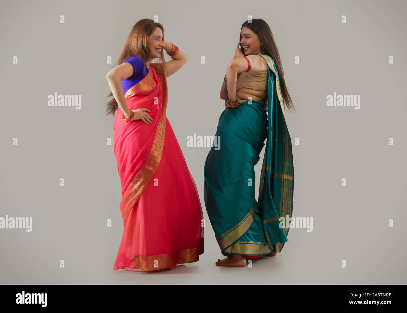 young women dancing in saree Stock Photo - Alamy