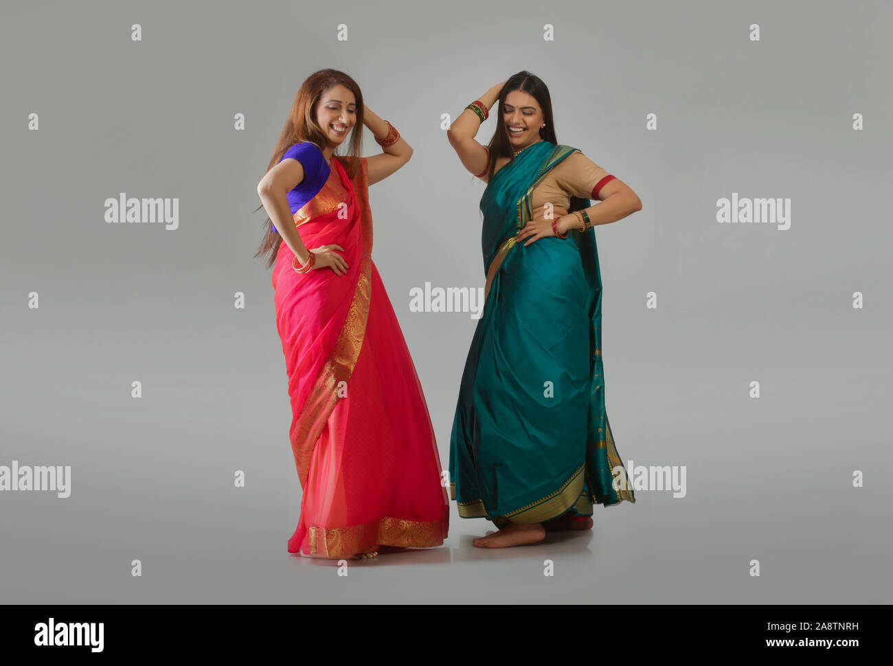 young women dancing in saree Stock Photo - Alamy