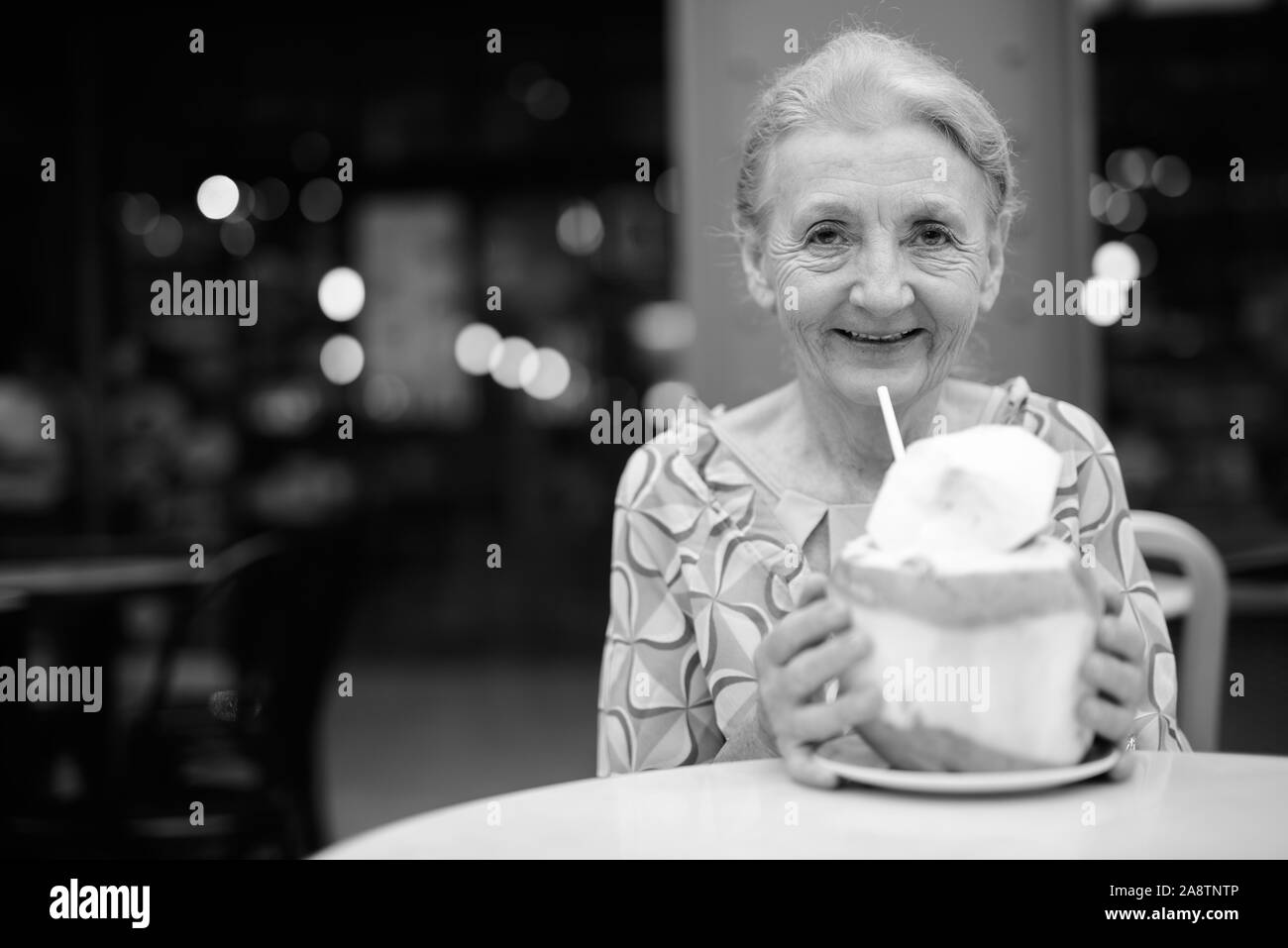 Senior black woman with water hi-res stock photography and images - Alamy