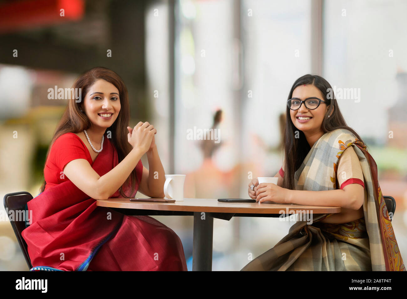 Two women having tea hi-res stock photography and images - Alamy