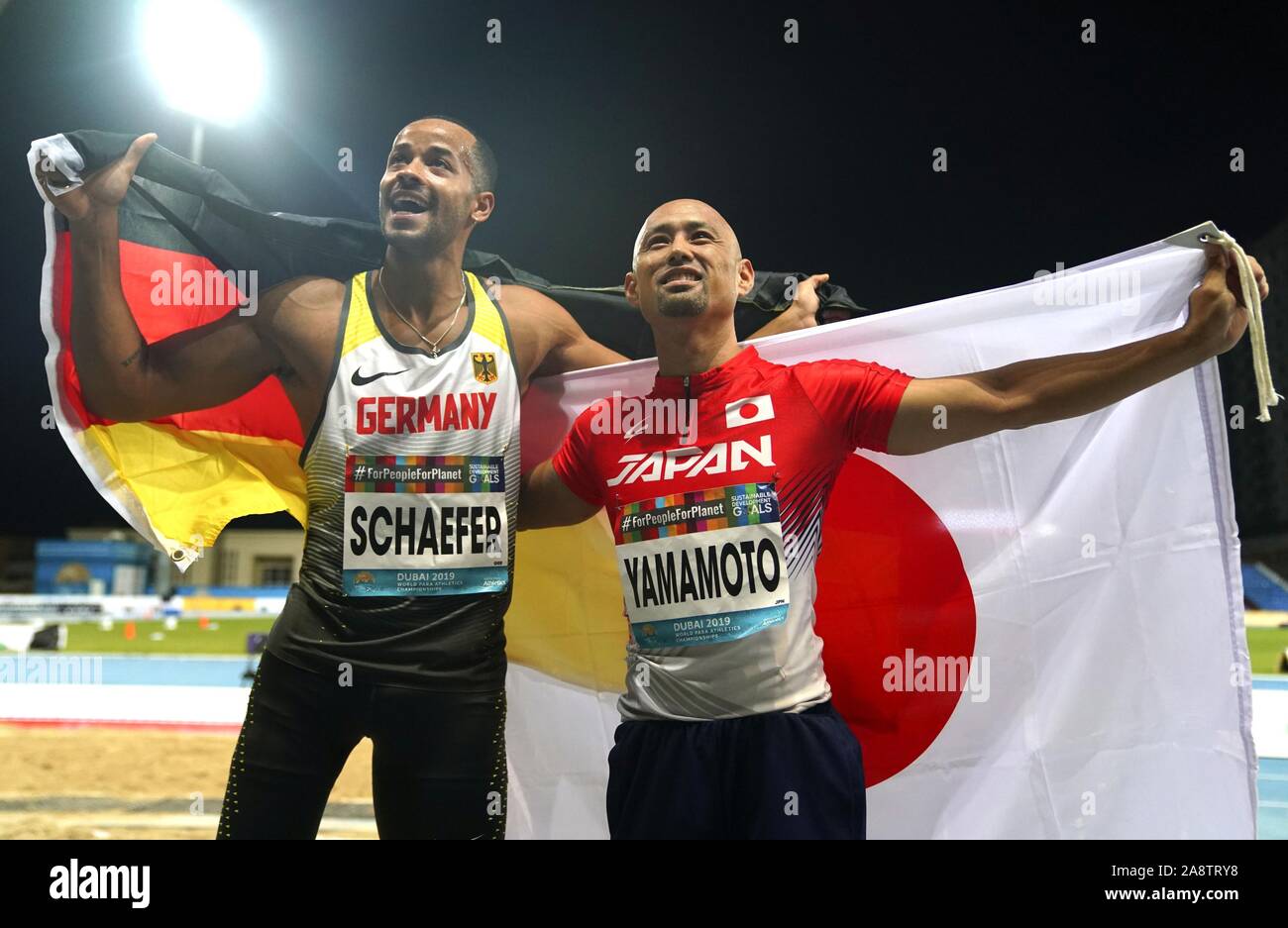 Germany's Leon Schaefer (L) poses for a photo after winning the men's ...