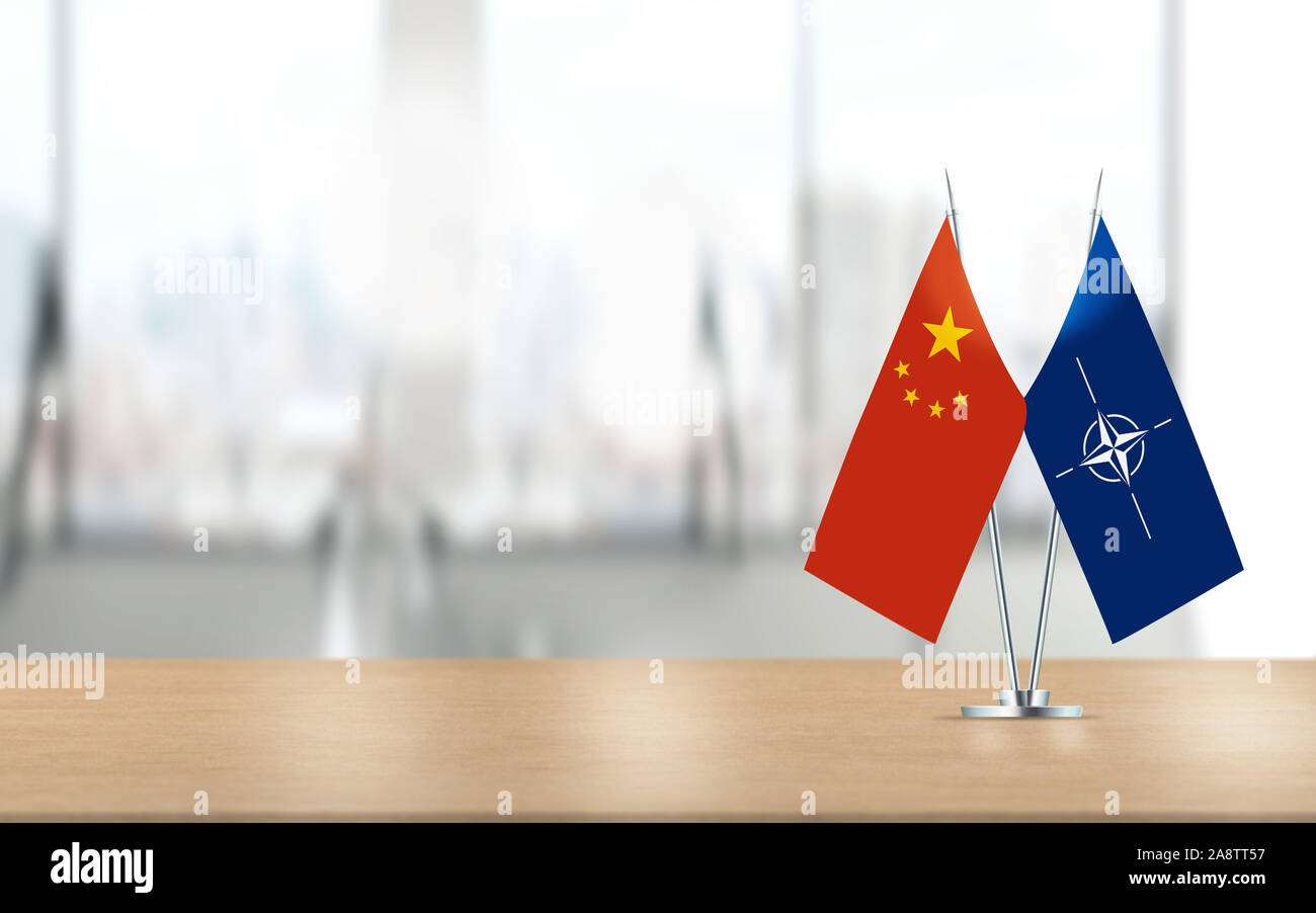 Chinese and NATO flags are paired together. Realistic 3D lighting and ...