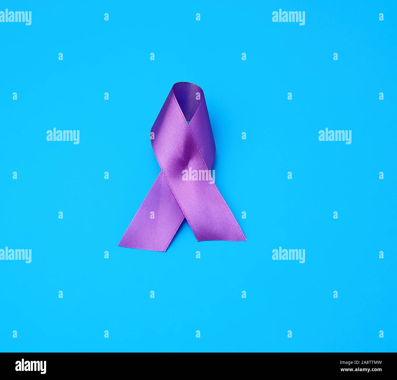 purple ribbon as a symbol of early research and disease control ...