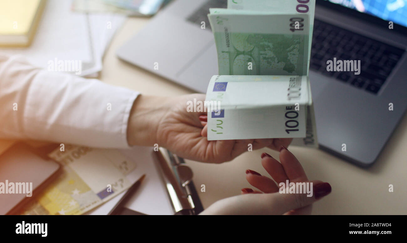 Business Woman Counting Money. Close up of female hands counting euro ...