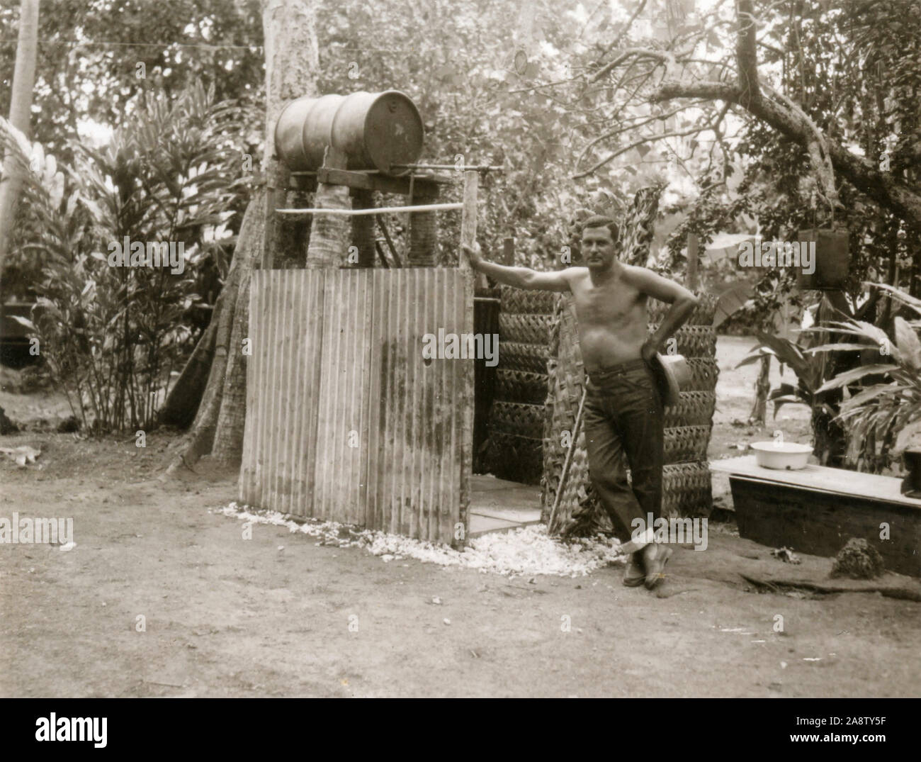 Man showing his shower, Bora Bora, French Polynesia 1956 Stock Photo ...