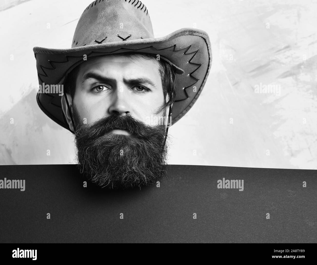 Man long beard cowboy hat hi-res stock photography and images - Alamy