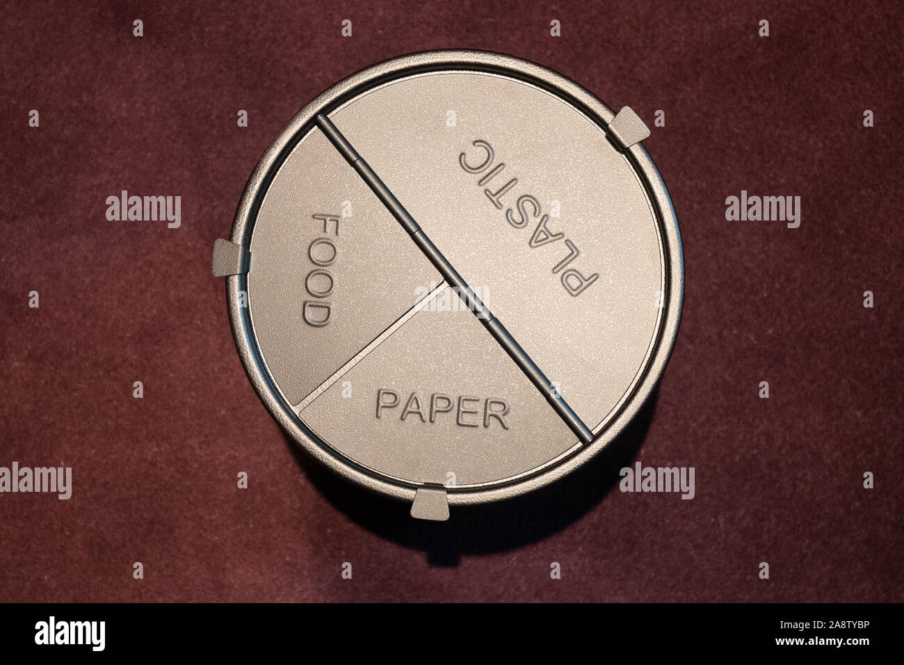 09 November 2019, Hamburg: A rubbish bin with three compartments ...