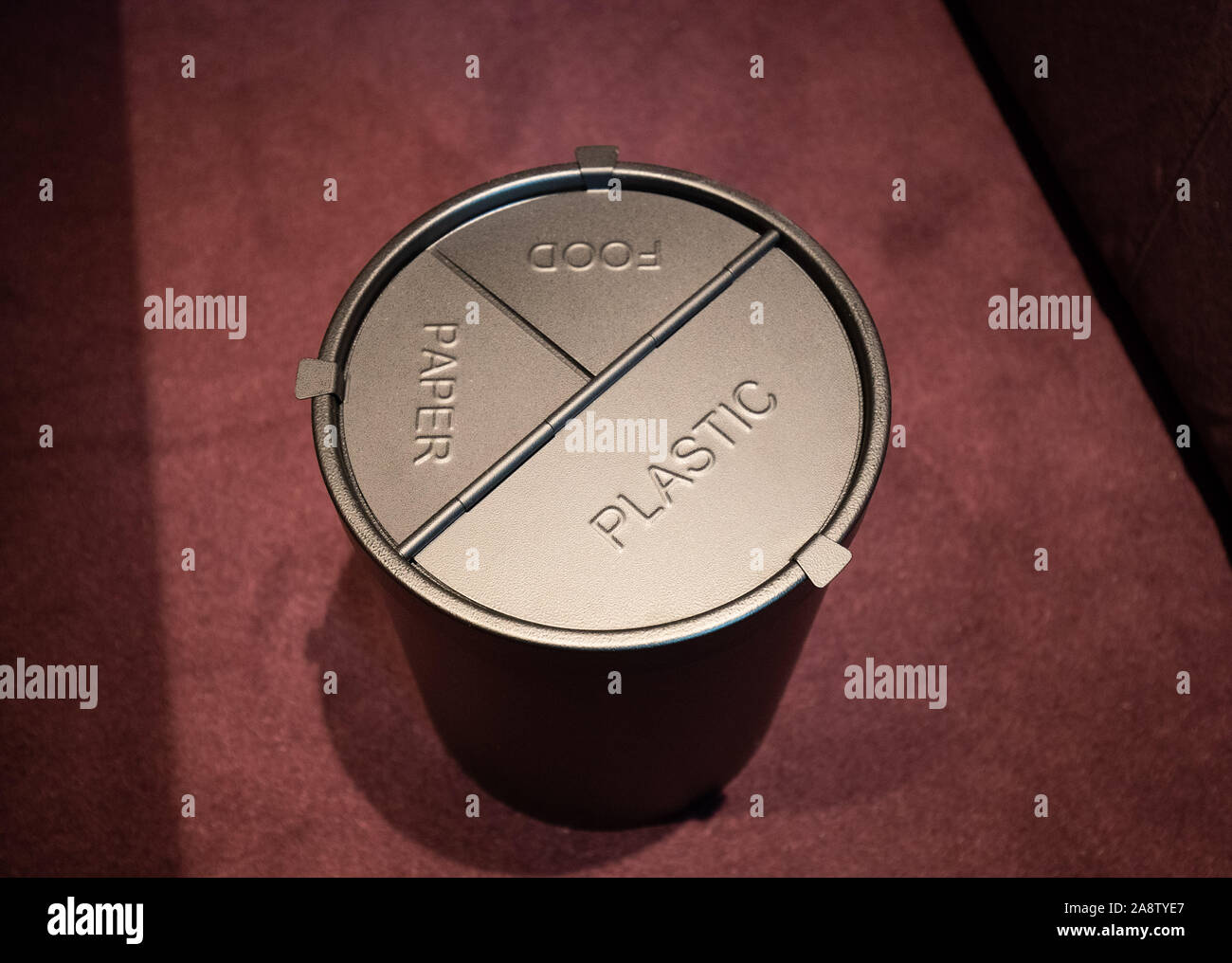 09 November 2019, Hamburg: A rubbish bin with three compartments ...