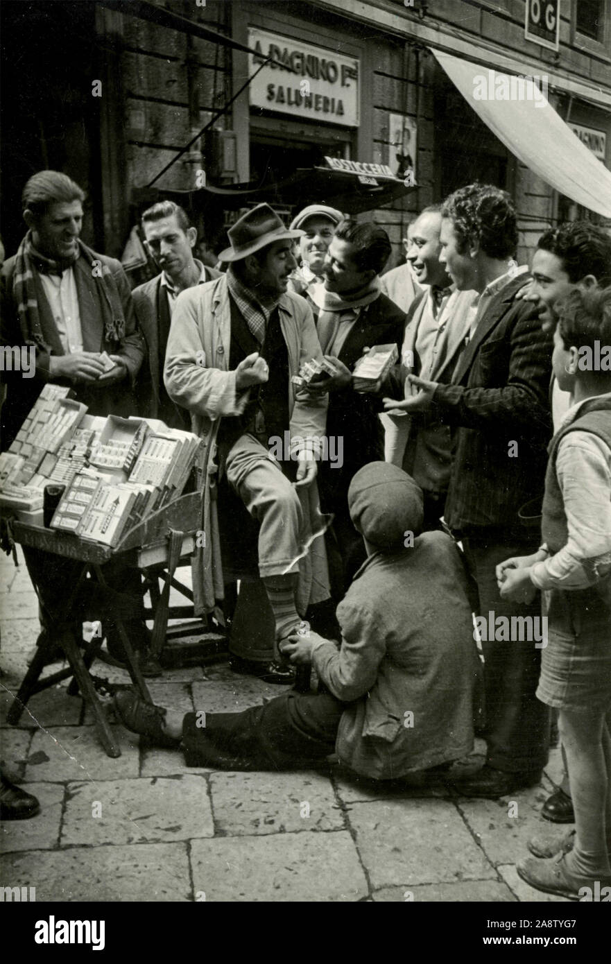 Smugglers selling American cigarettes in Vucciria market, Palermo ...