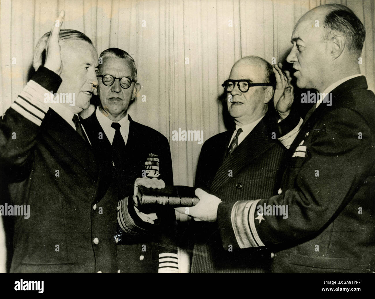 US Admiral Forrest P. Sherman being sworn as Chief of Naval operation ...