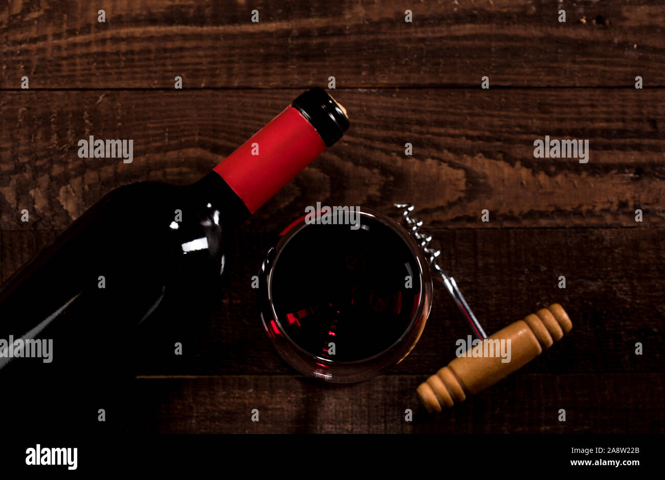 Red Wine in glass and buttle on wooden background with copy space Stock ...