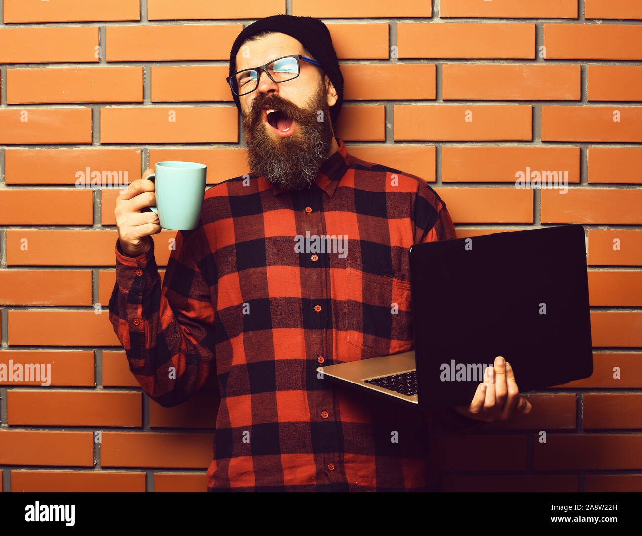 Bearded man, long beard. Brutal caucasian yawning unshaven hipster ...